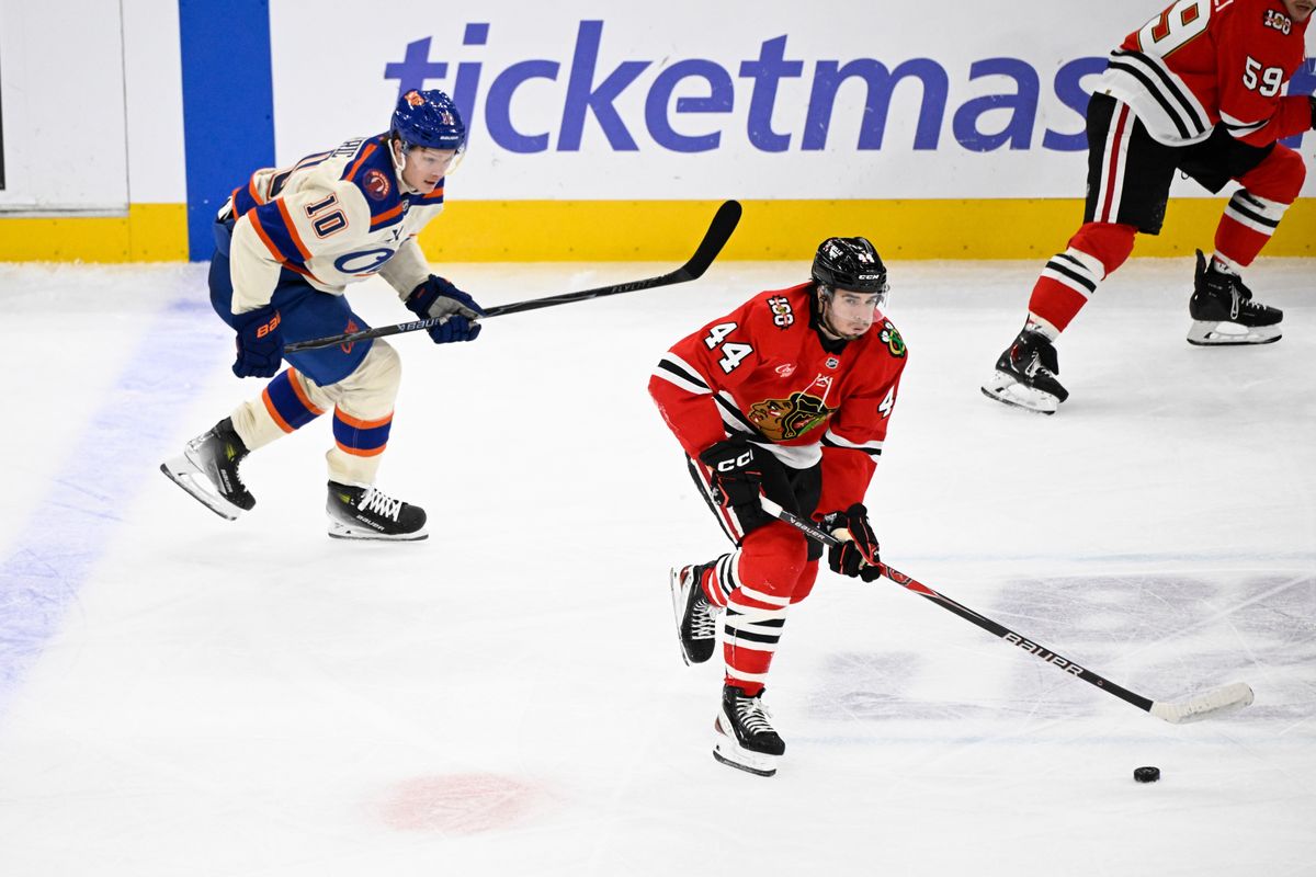 McDavid and Bouchard help the Oilers beat the Blackhawks 4-1 ...