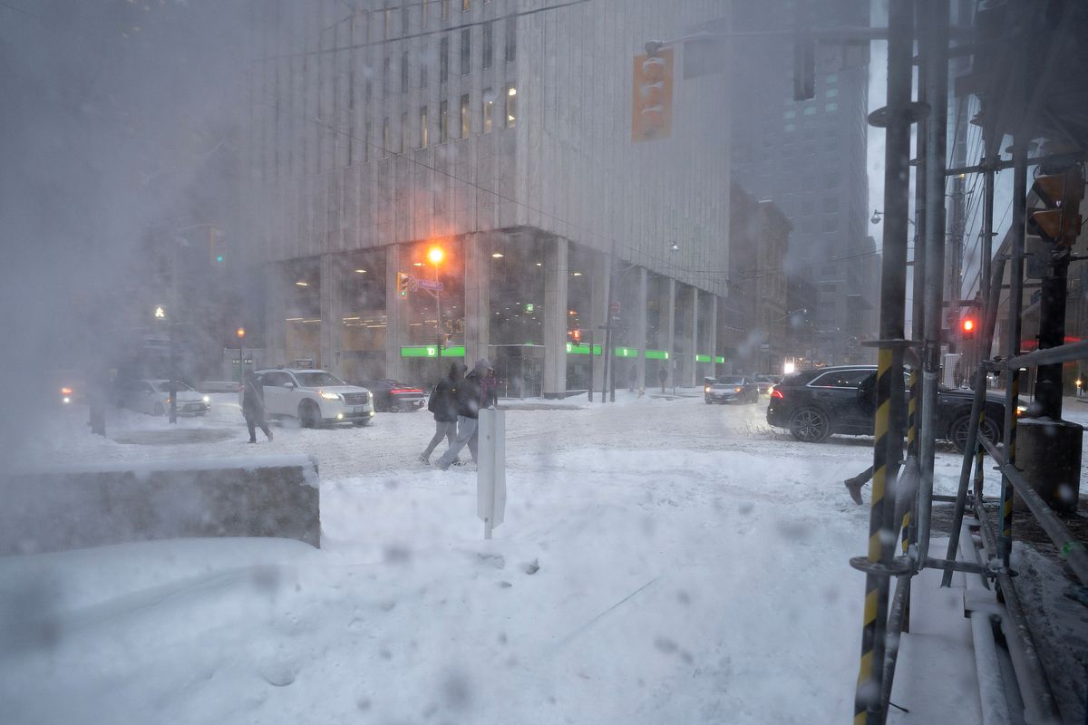Toronto schools closed and commuters face delays as heavy snow blankets ...