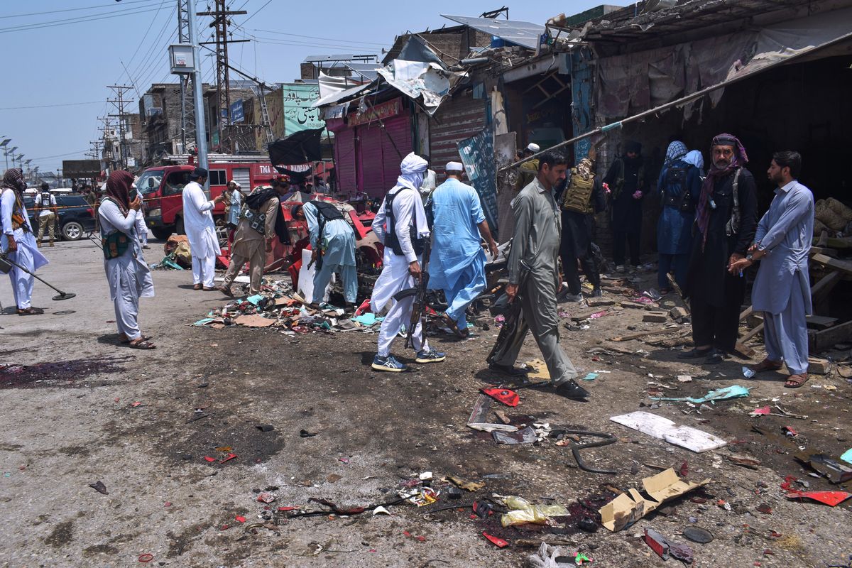 Bomb rigged to rickshaw explodes in Pakistan bazaar, killing 9 and ...