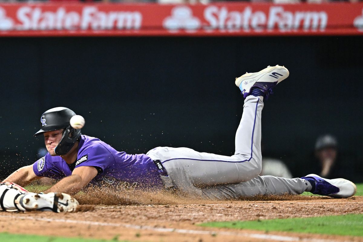 Goodman’s 3-run homer and Rumfield’s sac fly help Rockies rally for 9-8 ...