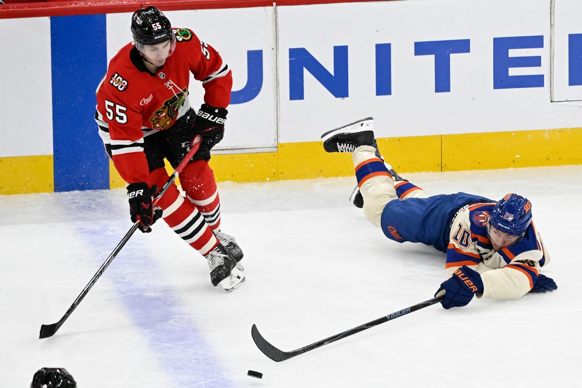McDavid and Bouchard help the Oilers beat the Blackhawks 4-1 ...