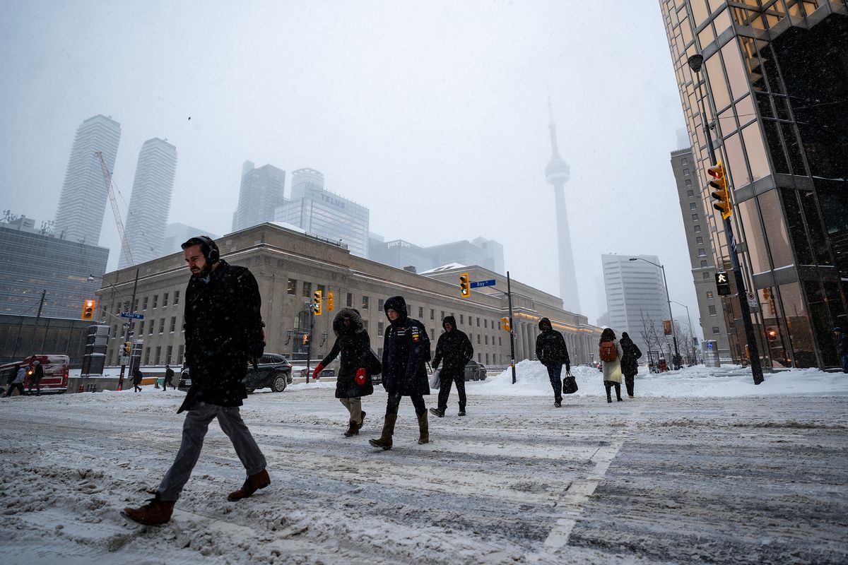 Toronto schools closed and commuters face delays as heavy snow blankets ...