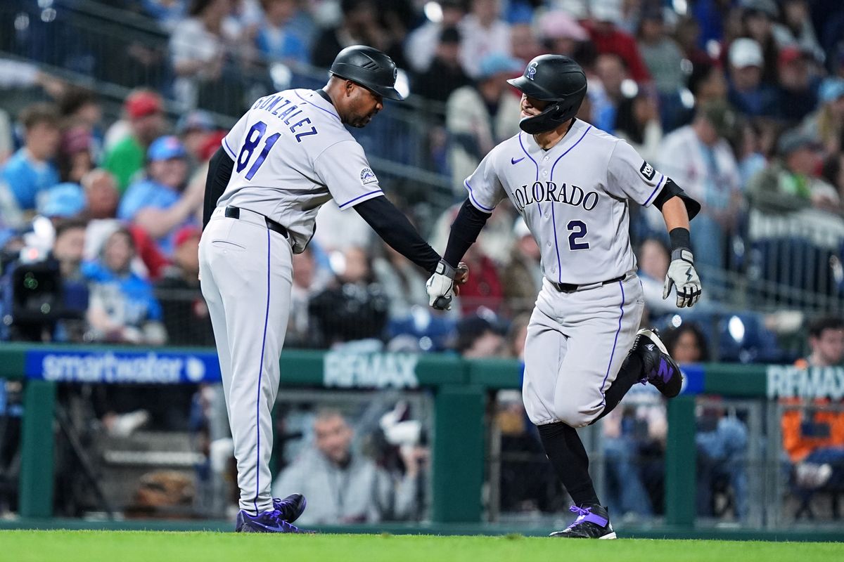 Troy Johnston has go-ahead hit in 11th as Rockies beat Phillies 9-7 ...