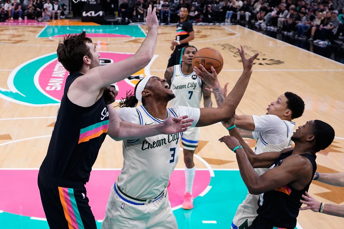 Wembanyama returns from injury scare to fuel Spurs past Bucks, 119-101 ...